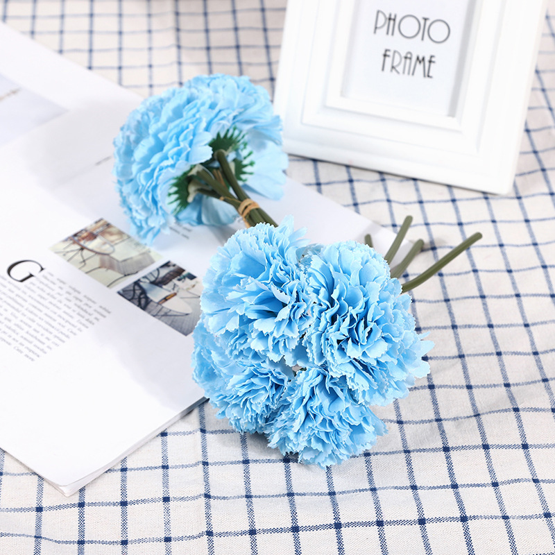 Four hand-carved carnations